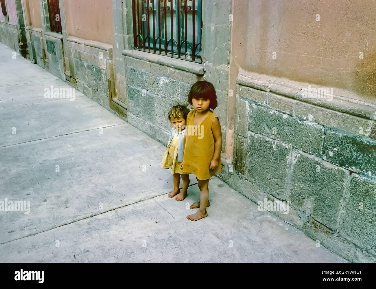 Two little Mexican girls Stock Photo - Alamy