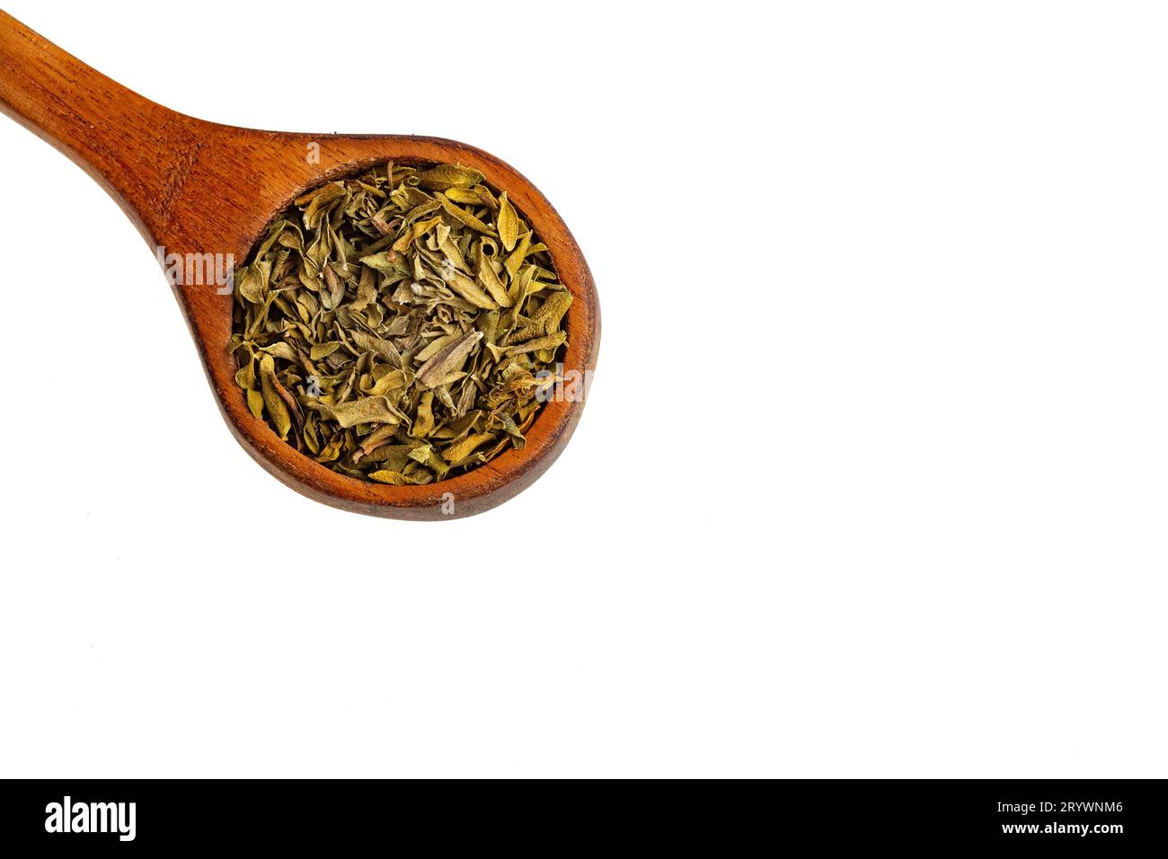 Dried rue leaves in the spoon - Ruta graveolens Stock Photo - Alamy