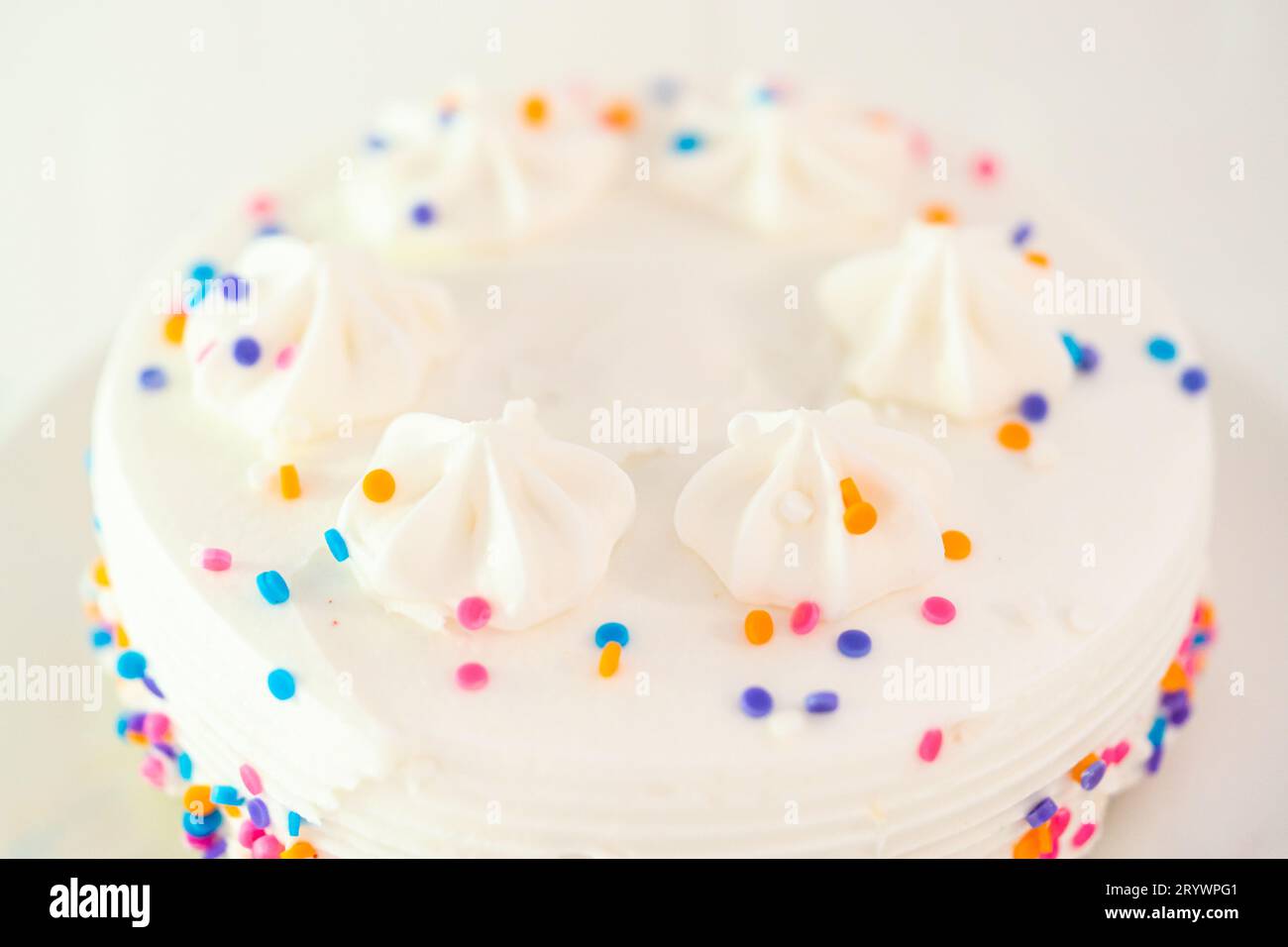 Birthday cake with funfetti sprinkles Stock Photo - Alamy
