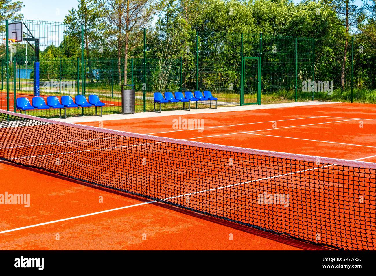 Public sports grounds for tennis and basketball Stock Photo - Alamy