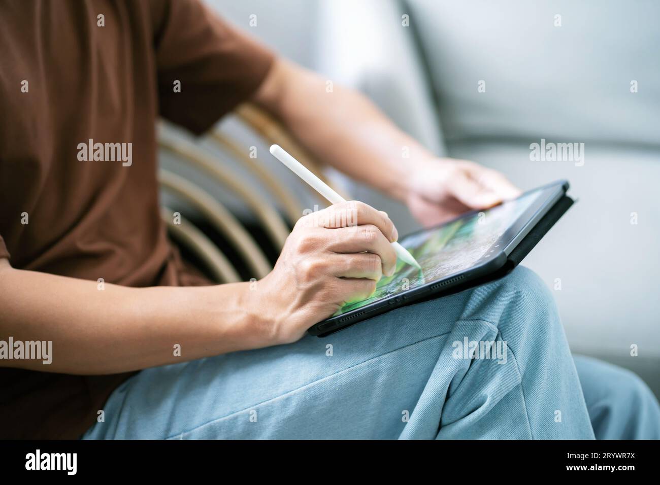 Graphic designer working on digital tablet. artist drawing on graphic tablet and Color swatch ...