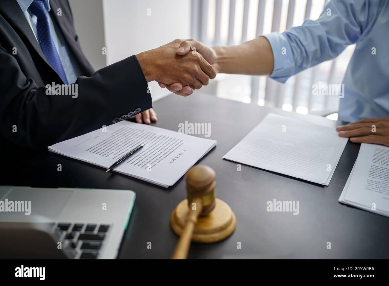 Lawyer Legal counsel Businessman shaking hands successful making a deal ...