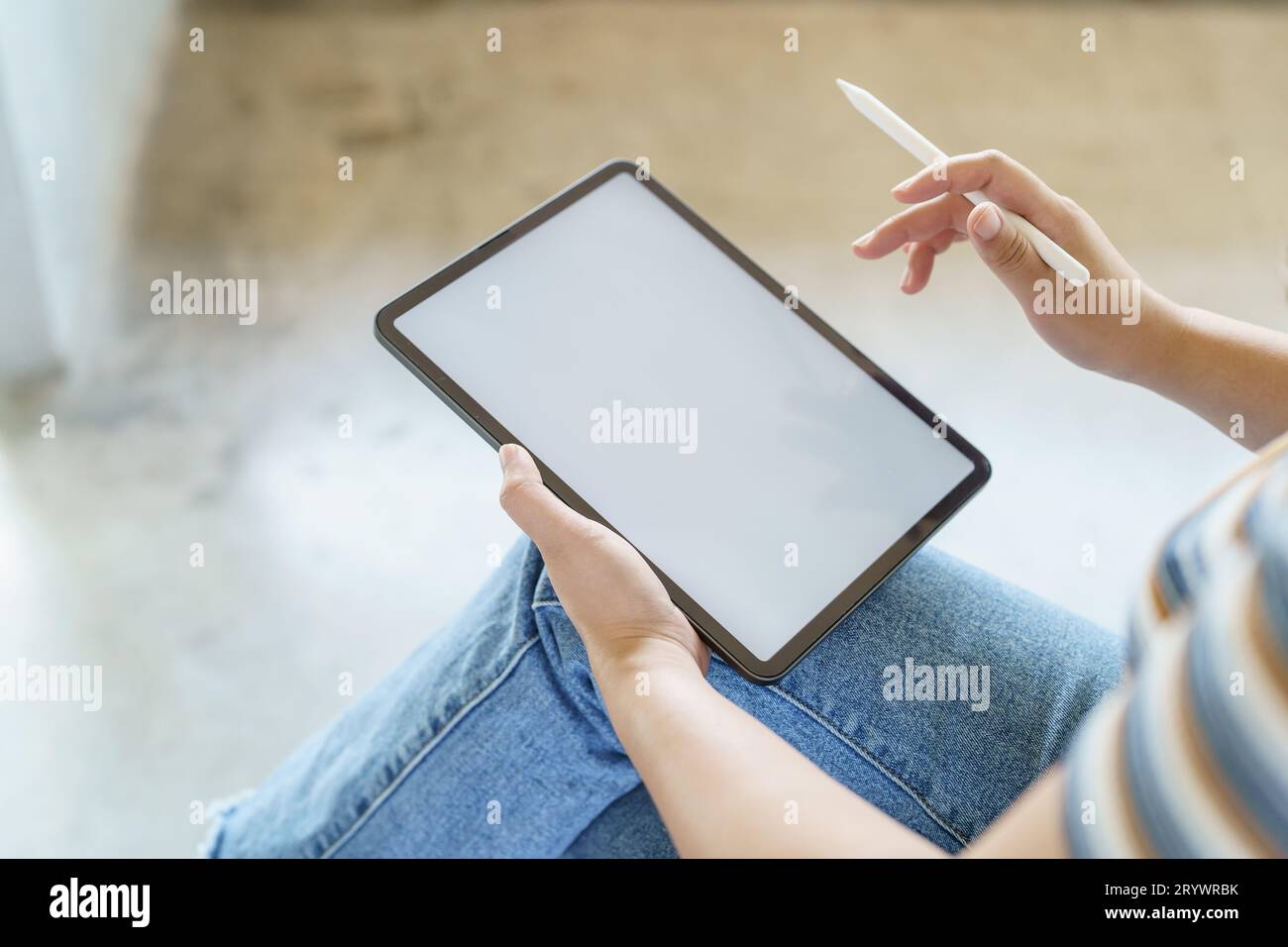 Woman holding blank screen on digital tablet device. technology ...
