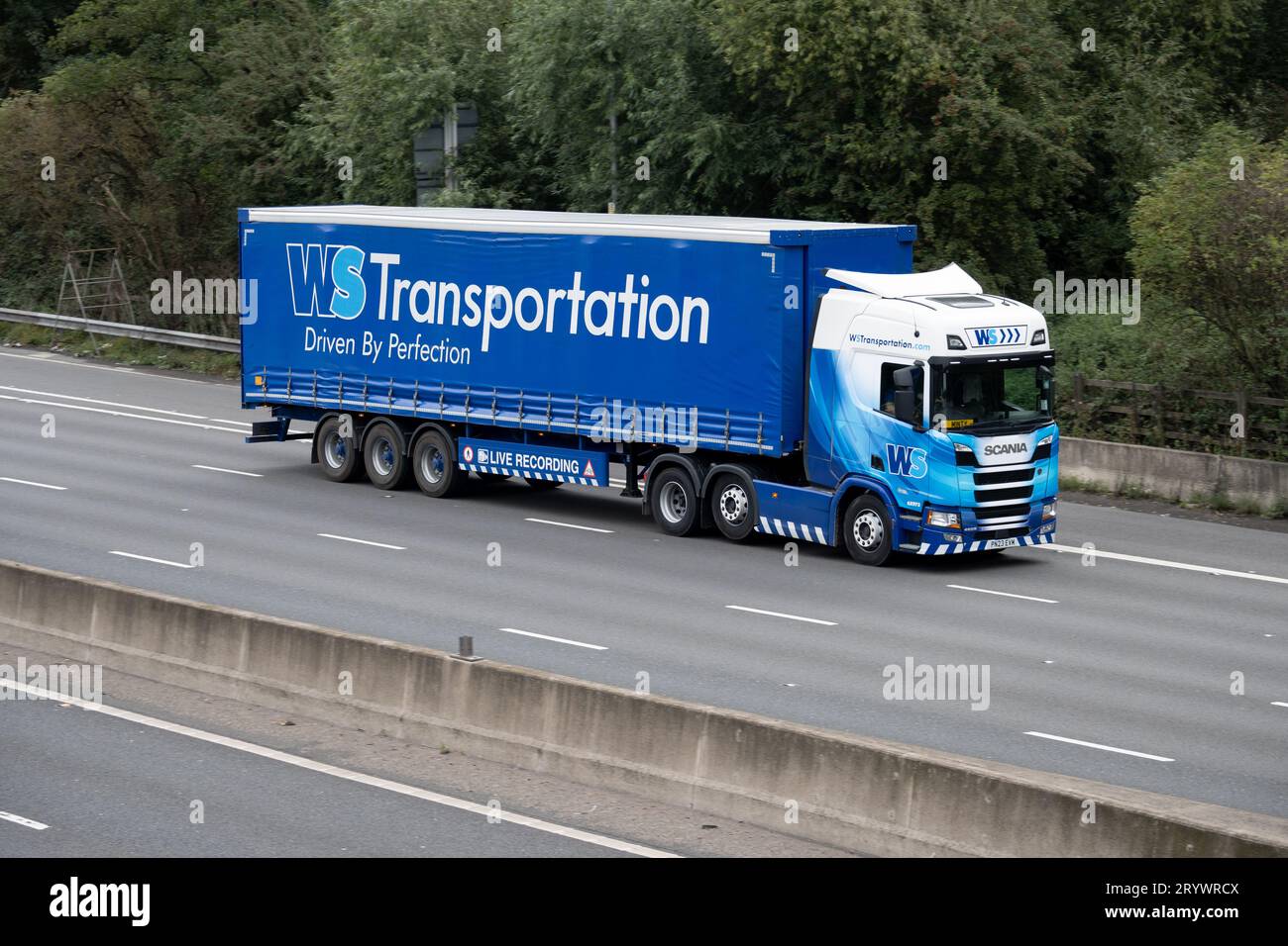 WS Transportation lorry on the M1 motorway, Northamptonshire, UK Stock ...