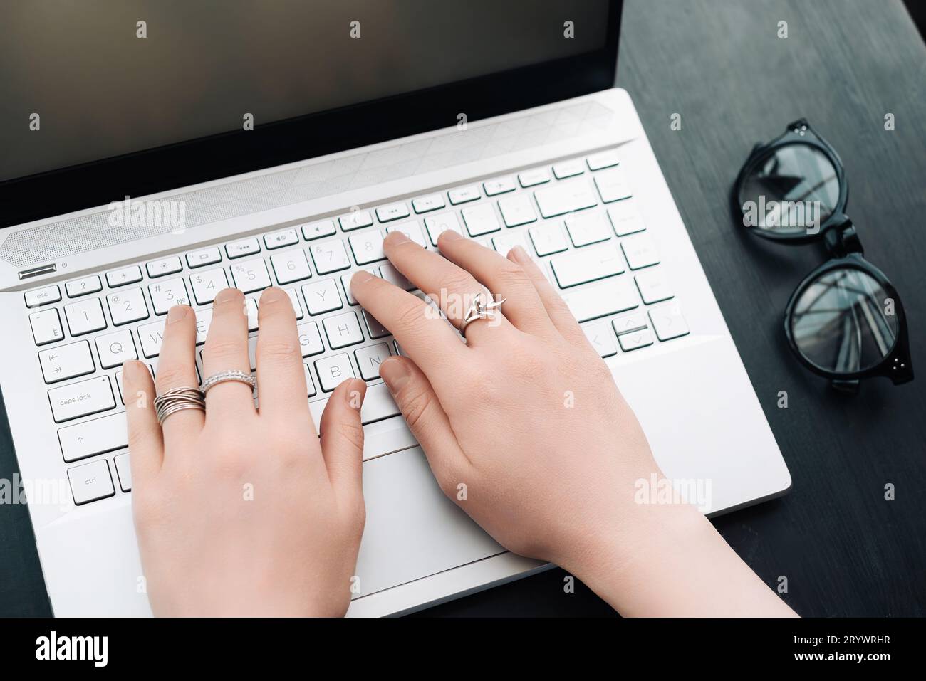 Versatile Work Environment. Woman's Hands Typing on Computer Keyboard ...