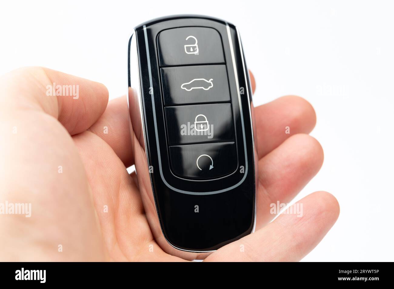 Black hand holding car key hi-res stock photography and images - Alamy