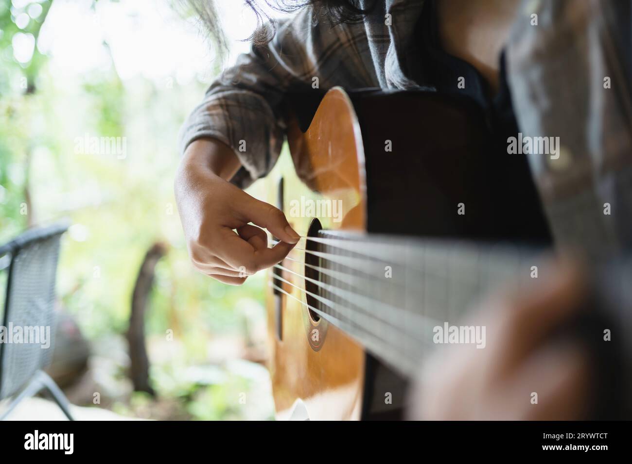 Happy young Woman hands playing acoustic guitar musician Â alone ...