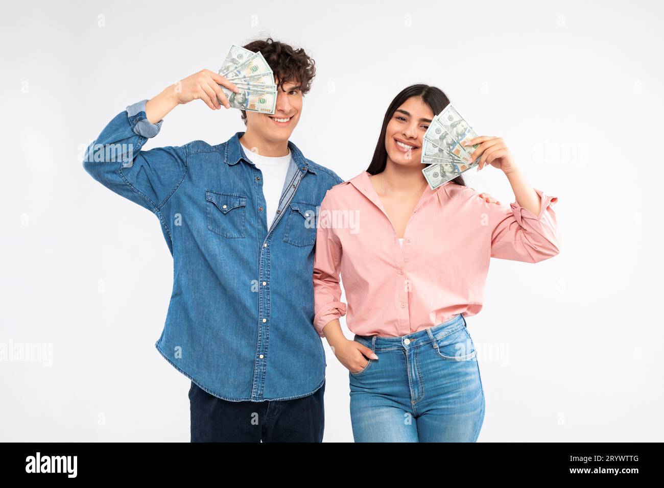 Couple celebrating winning money hi-res stock photography and images ...