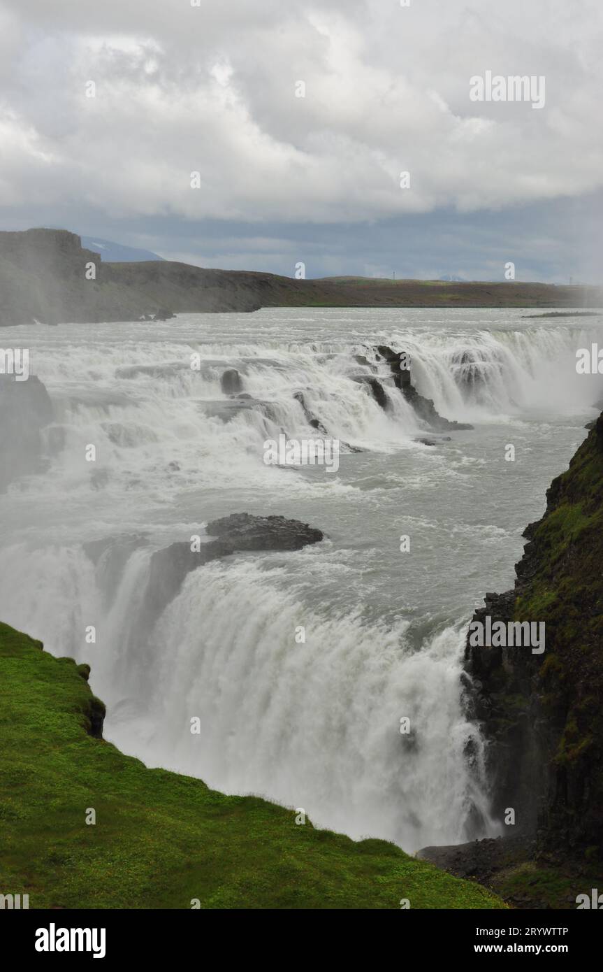 Aerial view of foamy Gullfoss Falls waterfall in the Hvita river in ...