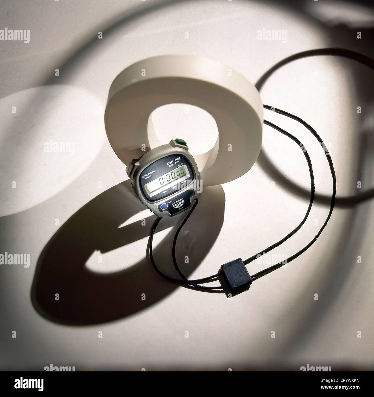 digital stop watch, w neck strap resting on zero Stock Photo - Alamy