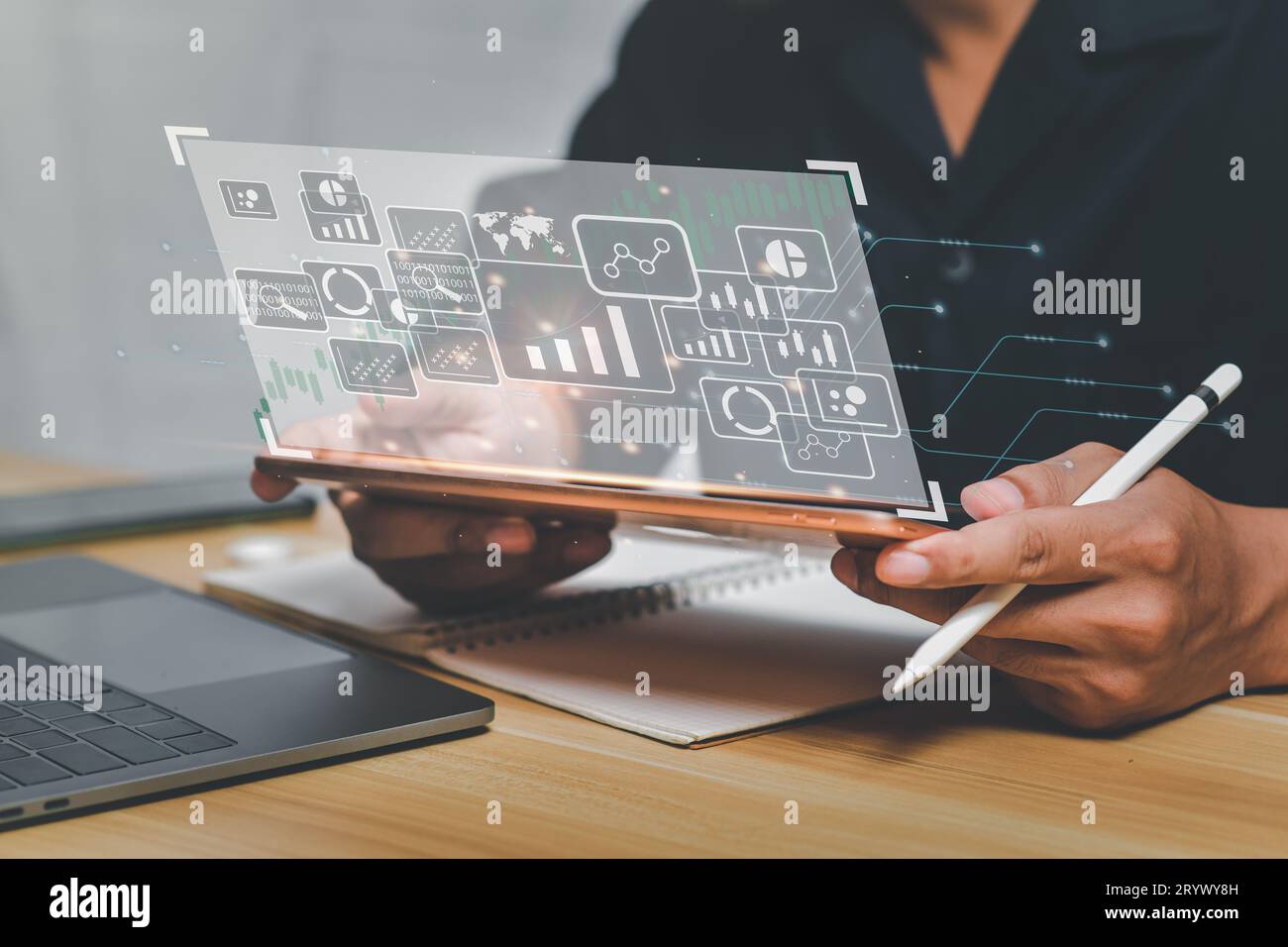 Businessman working and analyzing graph Stock Photo - Alamy