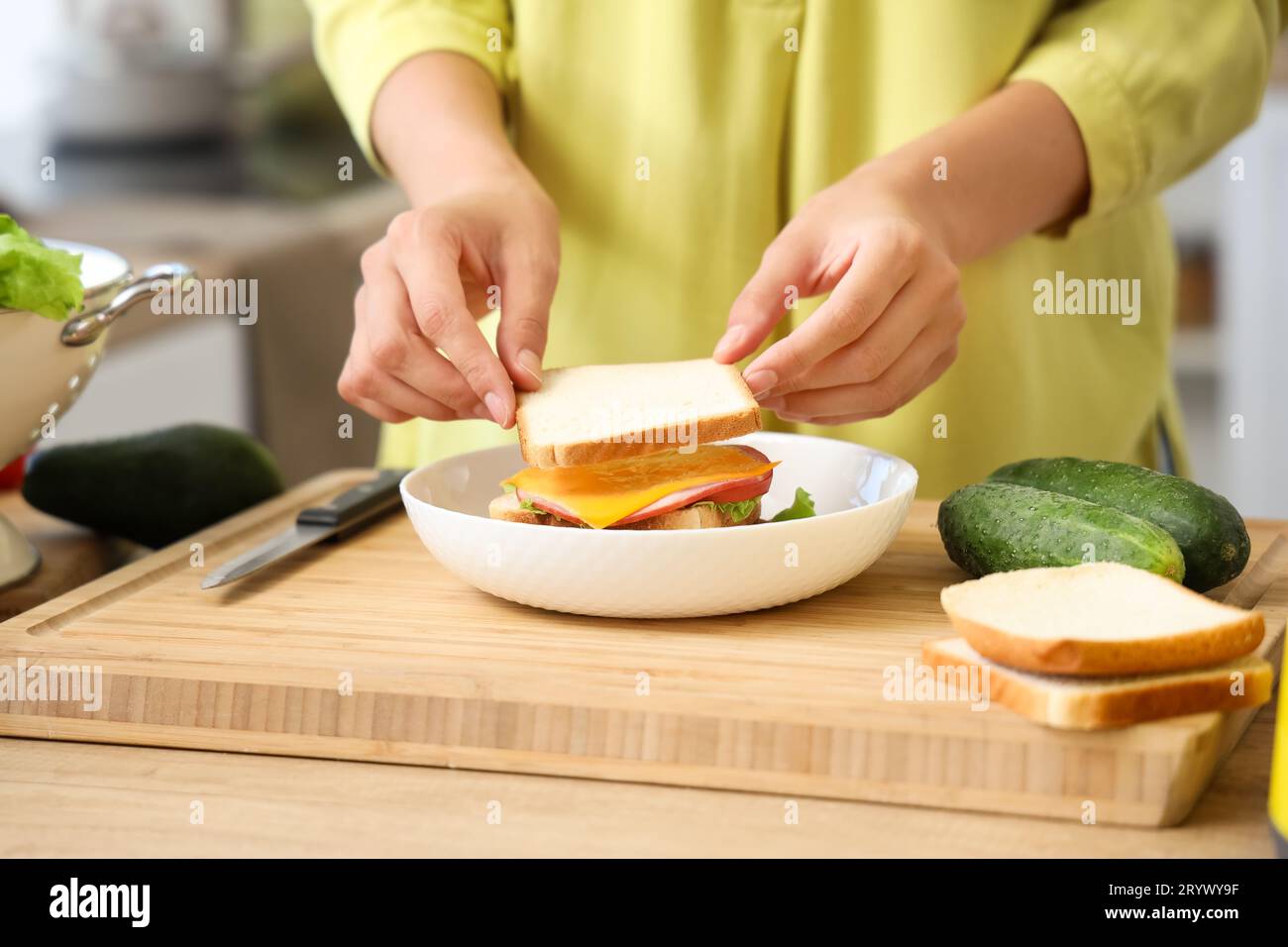 Woman making tasty sandwich in hi-res stock photography and images - Alamy