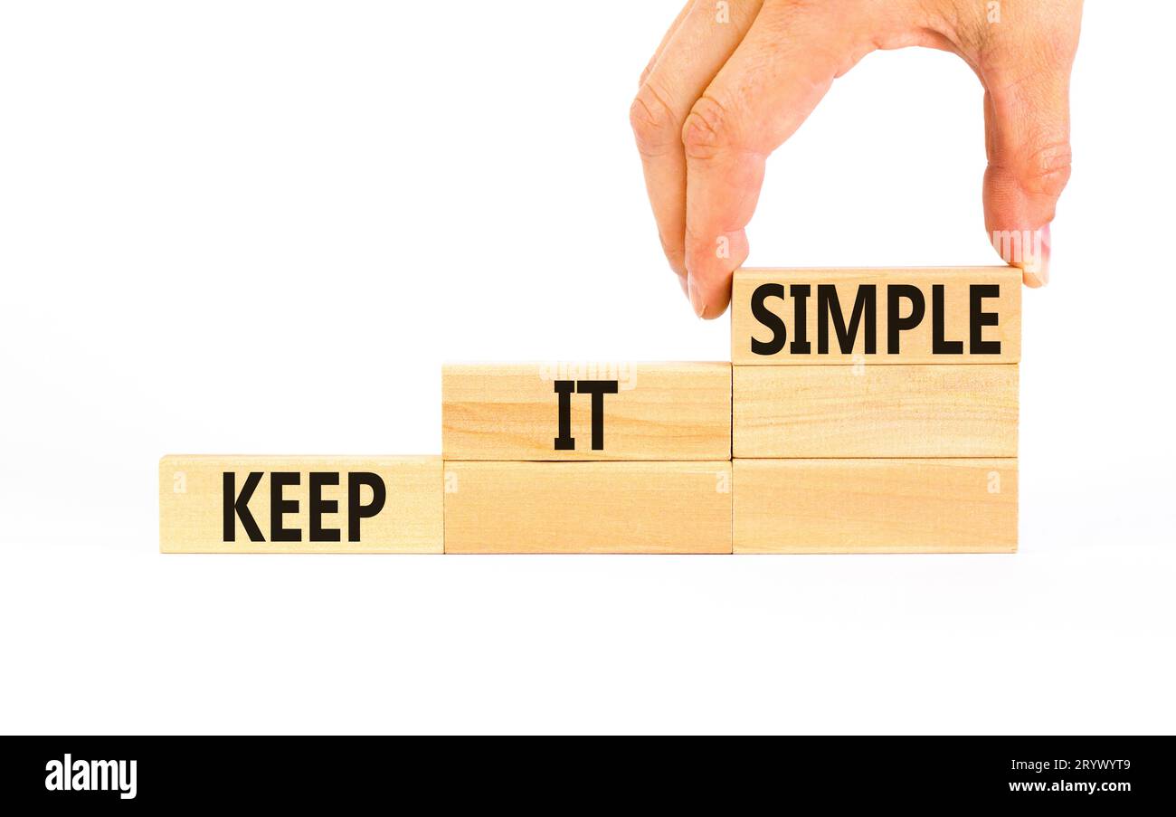 Keep it simple symbol. Concept word Keep it simple on beautiful wooden ...