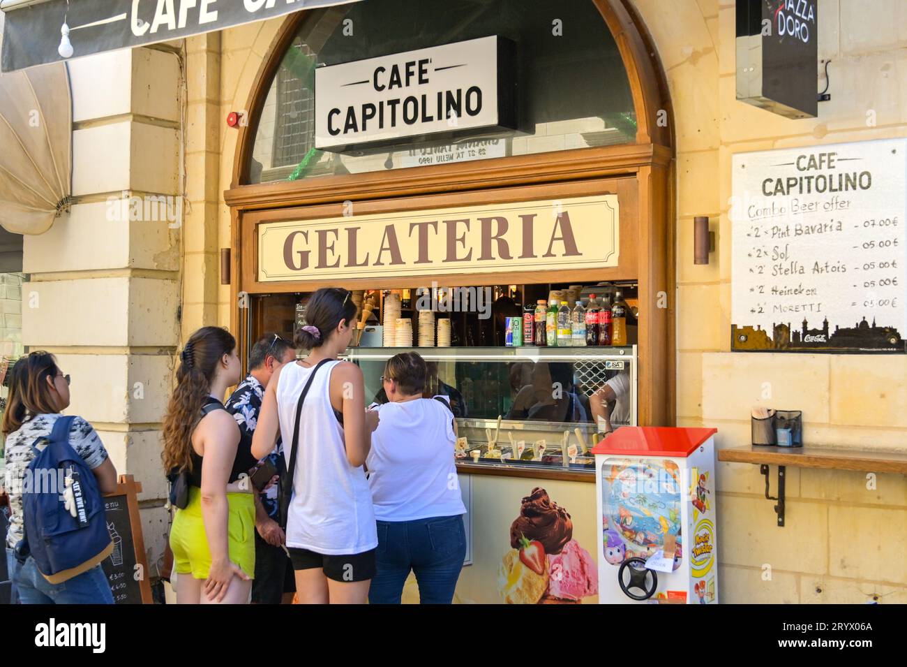 Valletta, Malta - 8 August 2023: People queuing to buy ice cream from a ...