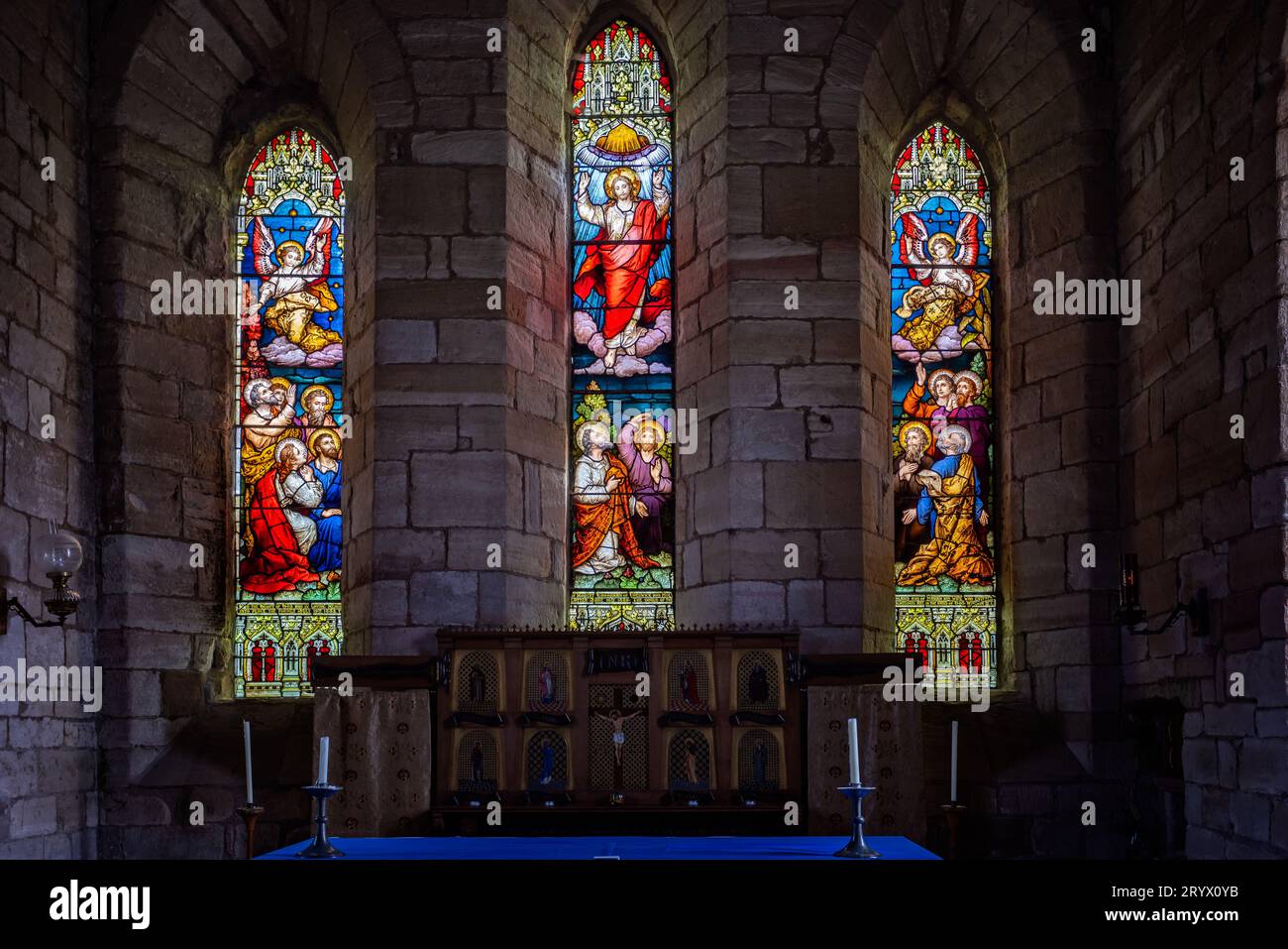 The three stained glass windows behind the altar in St Mary the Virgin ...