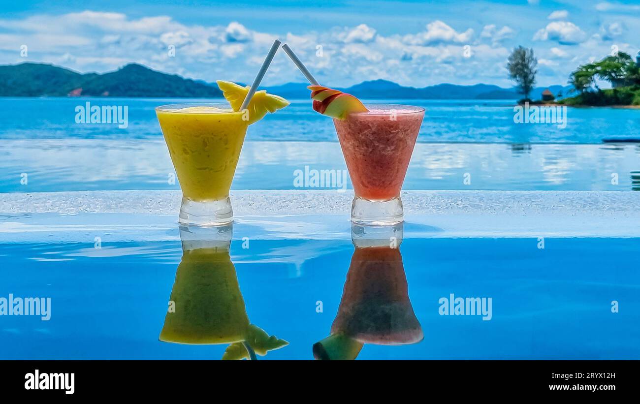 Cocktails on a edge of an infinity pool of an luxury hotel Stock Photo ...