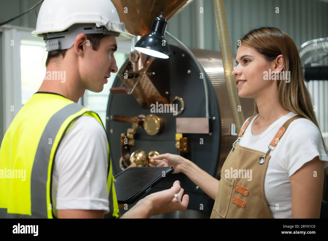 Young technician in uniform hi-res stock photography and images - Alamy