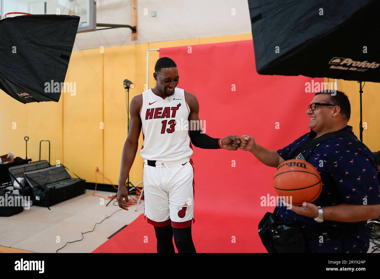 Miami Heat center Bam Adebayo (13) fist bumps Miami Herald photographer ...