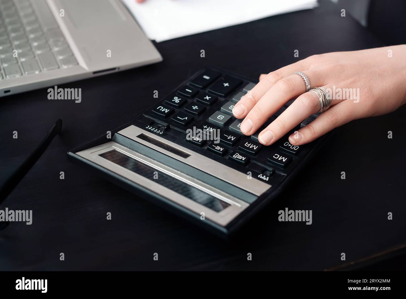 Efficient Financial Management. Woman Accountant Uses Calculator and ...