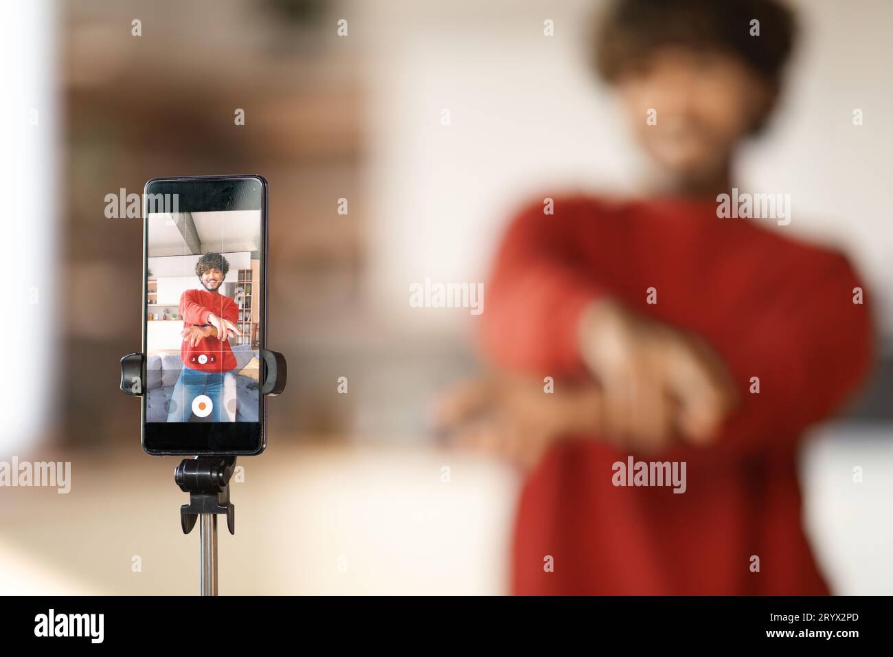 Young Indian Guy Dancing At Camera While Recording Video At Home Stock ...