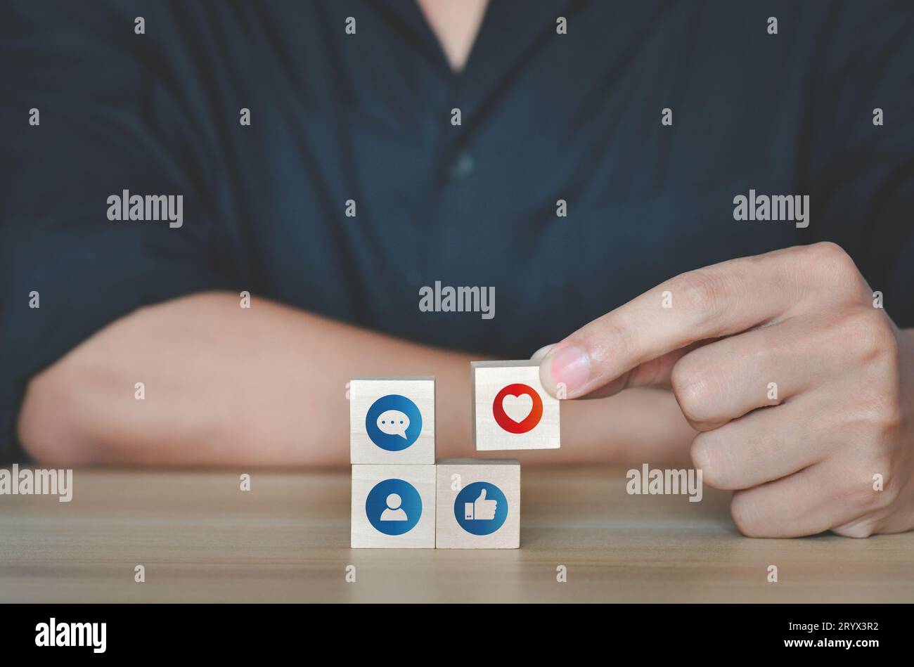 Hand putting wooden cube symbol of Social media and digital online ...