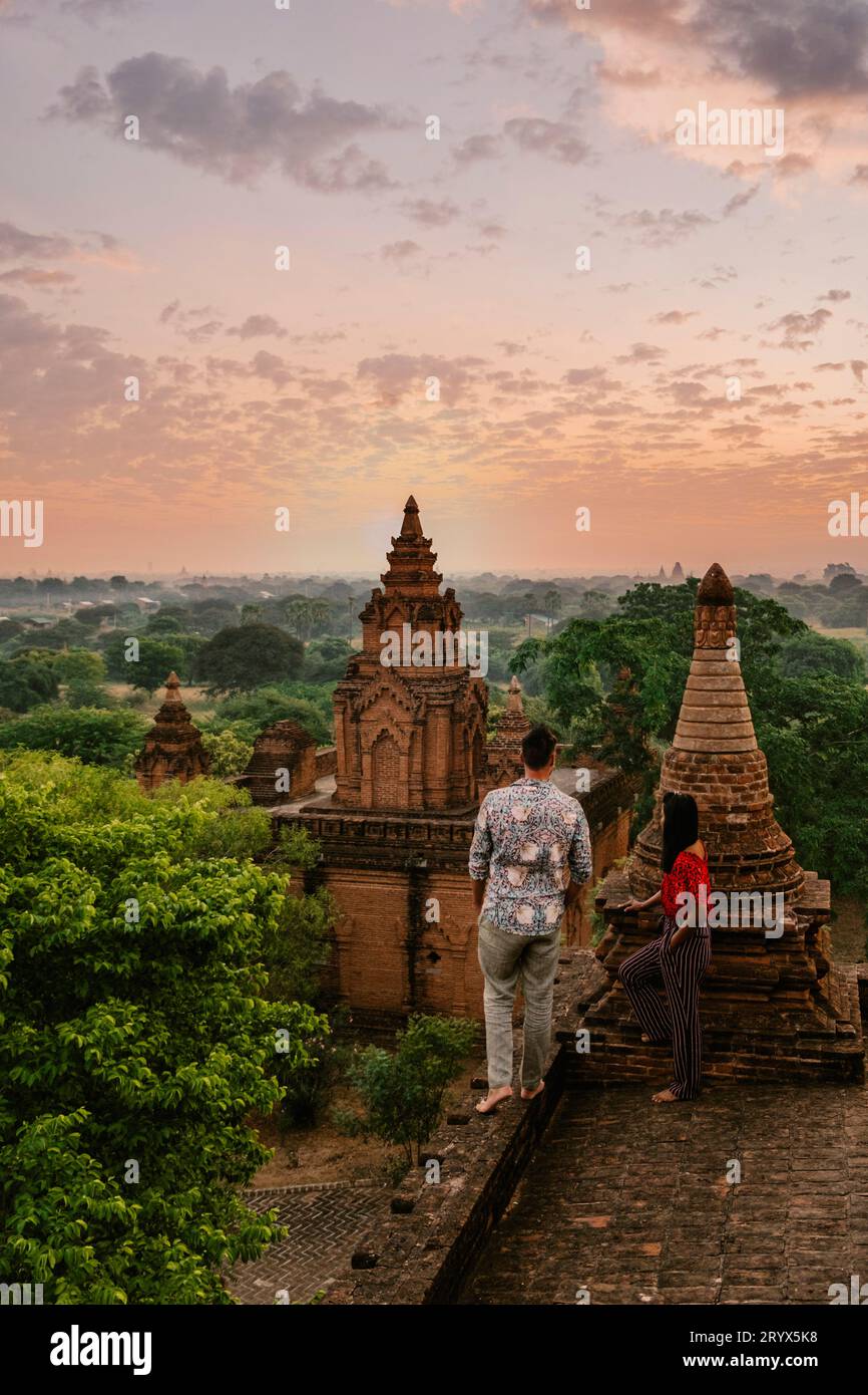 Bagan Myanmar, hot air balloon during Sunrise above temples and pagodas ...