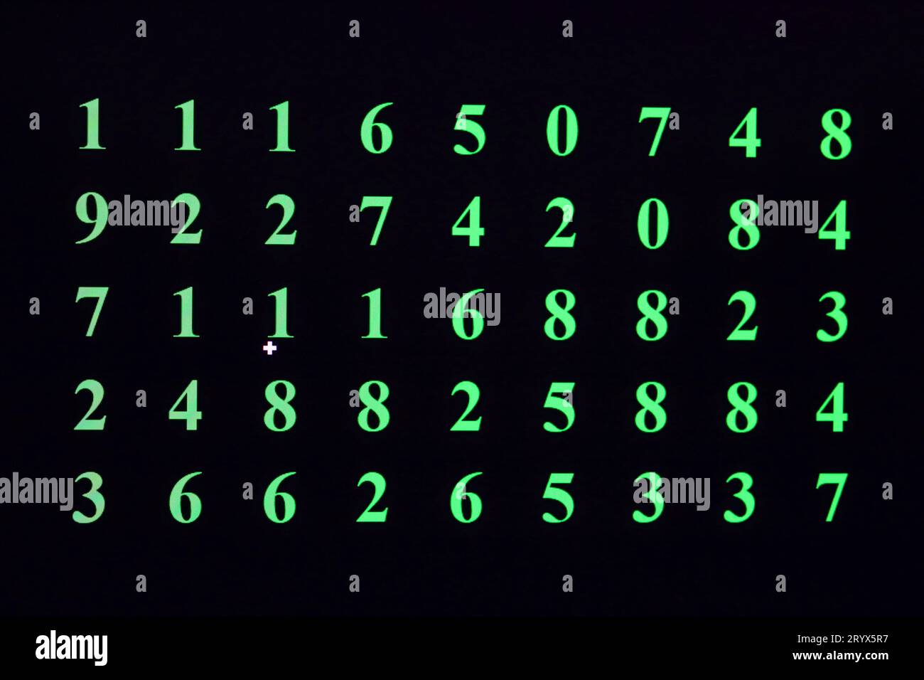GREEN random numbers on black background of personal computer screen ...