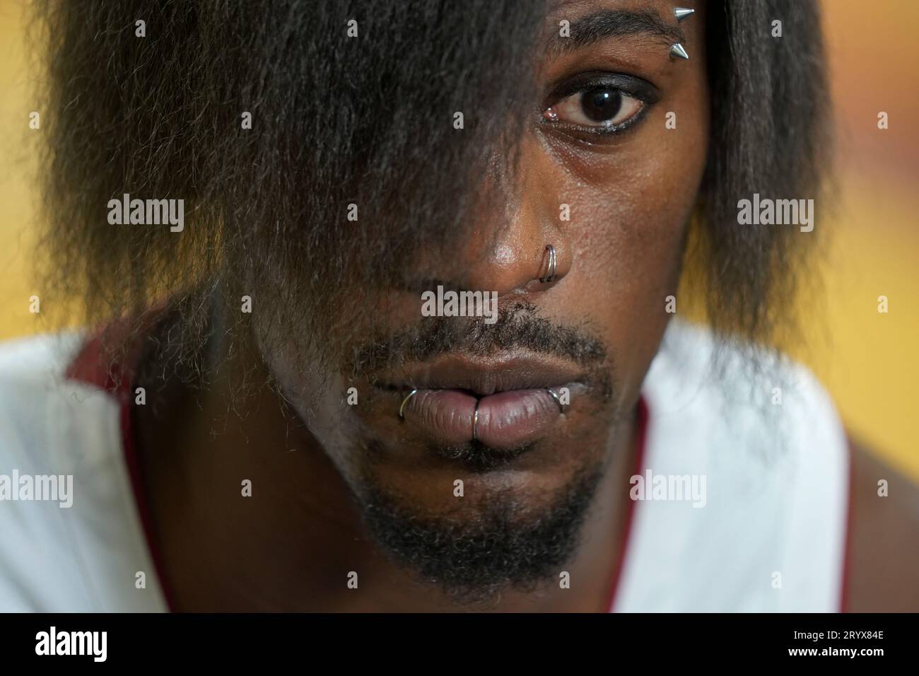 Miami Heat forward Jimmy Butler, sporting a new hairdo and piercings ...