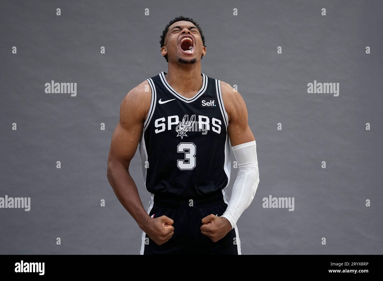 San Antonio Spurs forward Keldon Johnson (3) poses for photos during an ...