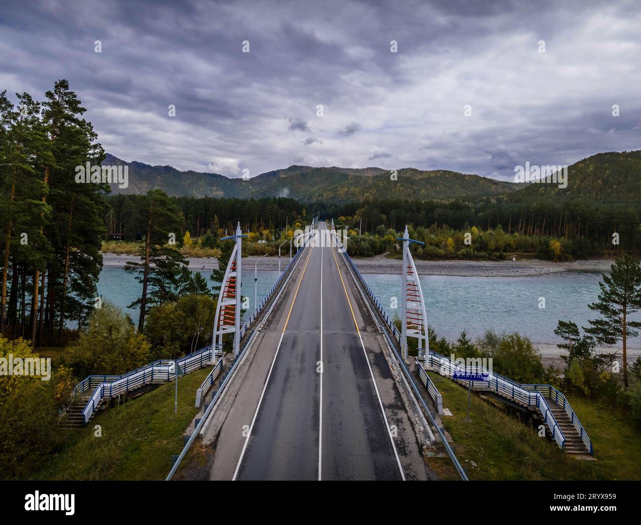 The car bridge across the Katun river in the Altai mountains in Siberia ...