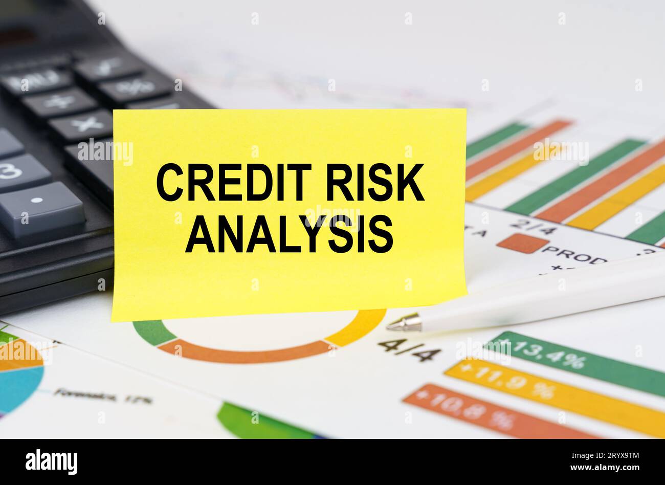 Business concept. On business reports there is a calculator and a sign with the inscription ...