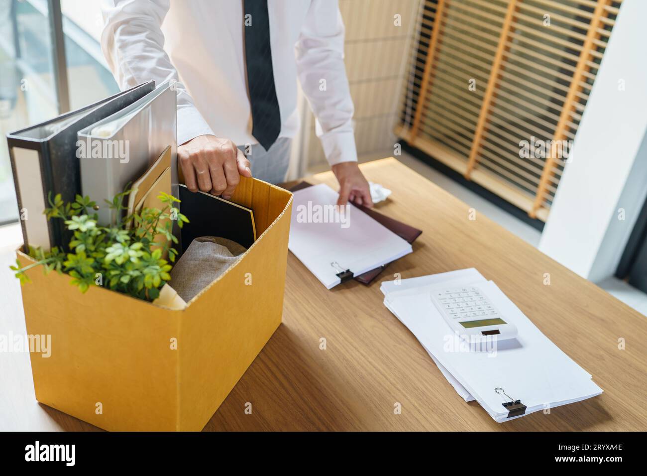 Quit Job Business man sending resignation letter and packing Stuff ...