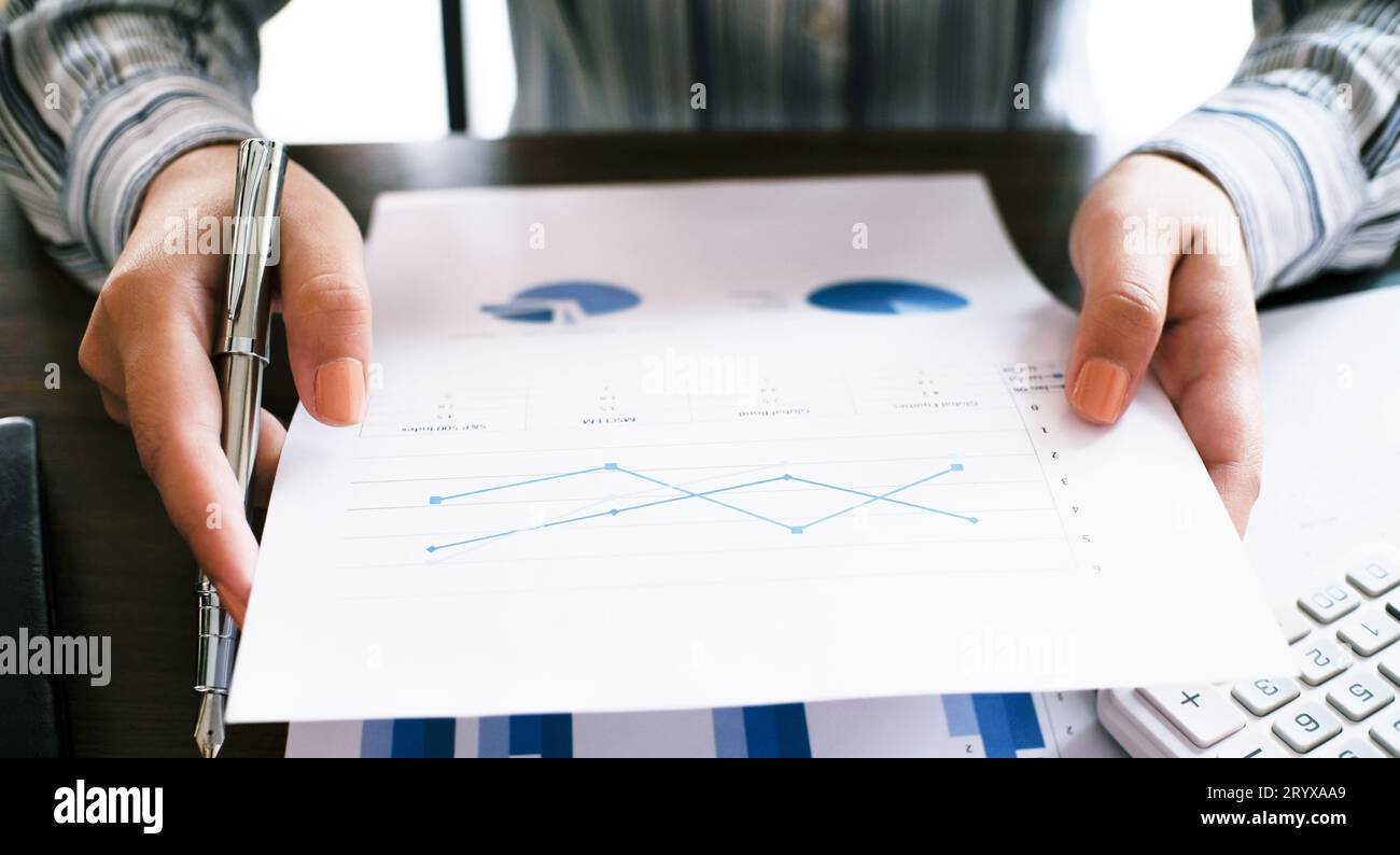 Financial inspector making report calculating or checking balance ...