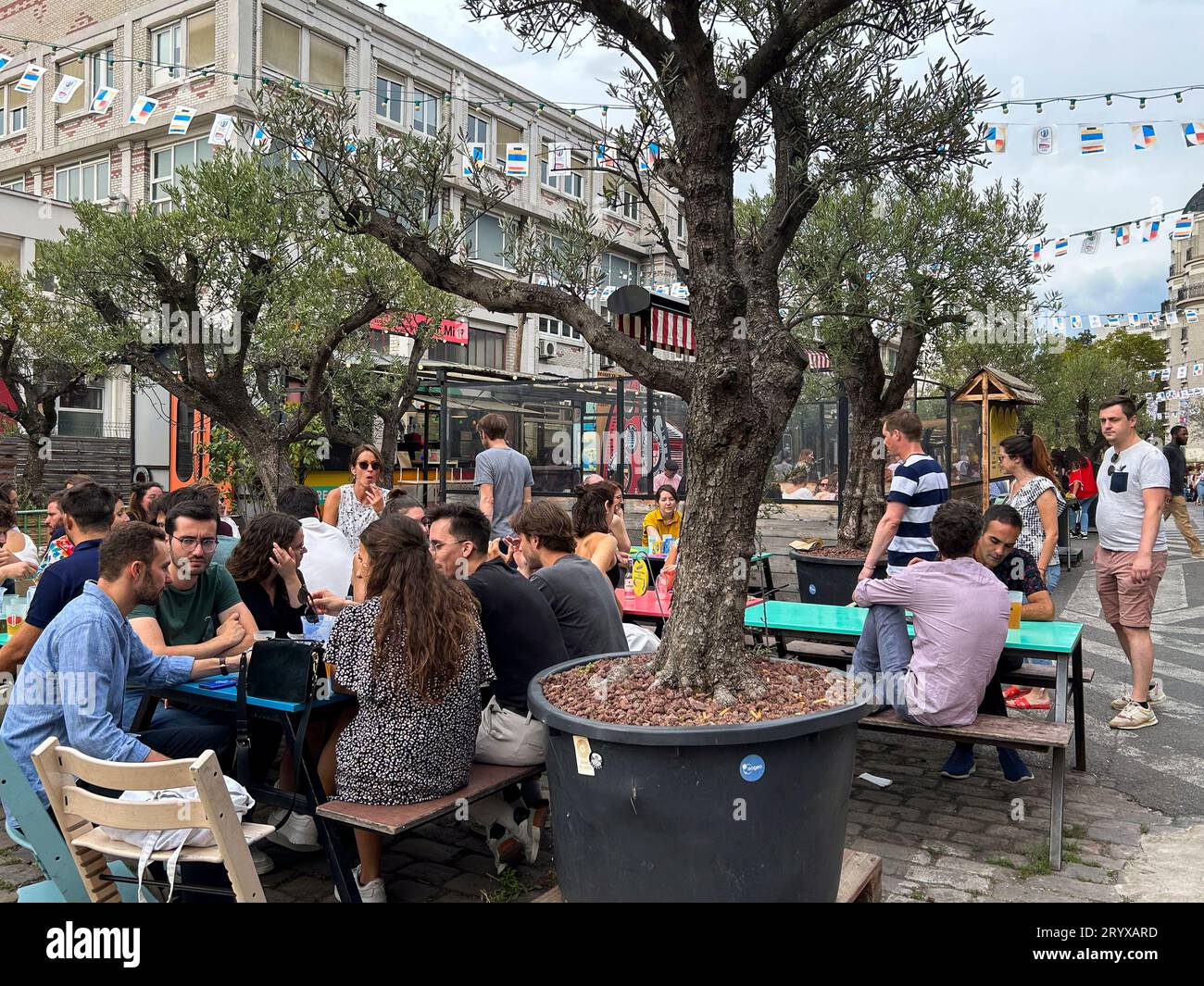 Paris, France, Large Crowd Young People, Sitting at Tables, on Terrace ...