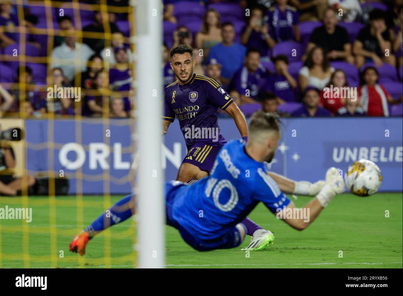 CF Montreal goalkeeper Jonathan Sirois, right, protects the goal ...