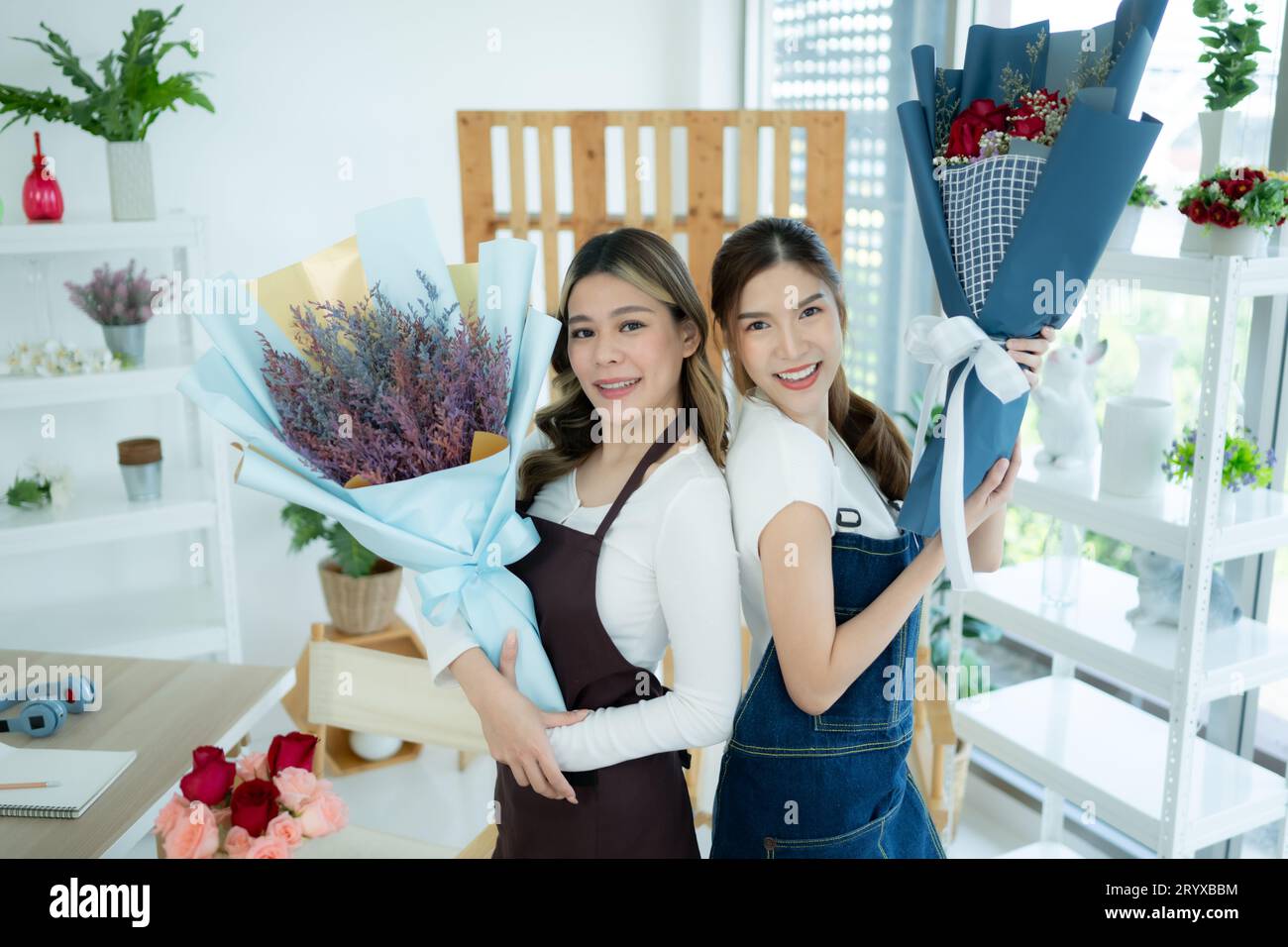 Asian female in floral hi-res stock photography and images - Alamy