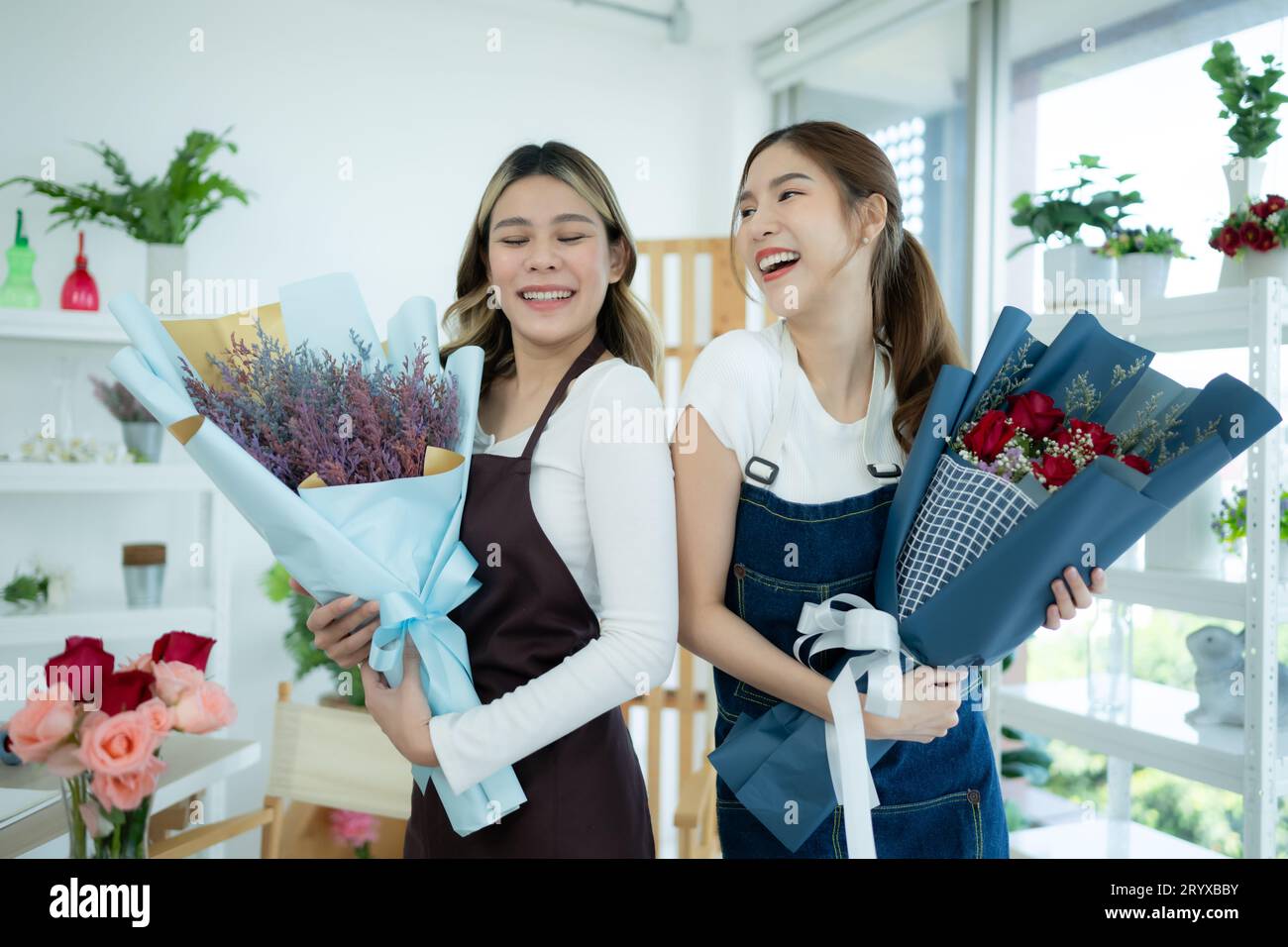 Asian woman holding fresh flower hi-res stock photography and images ...