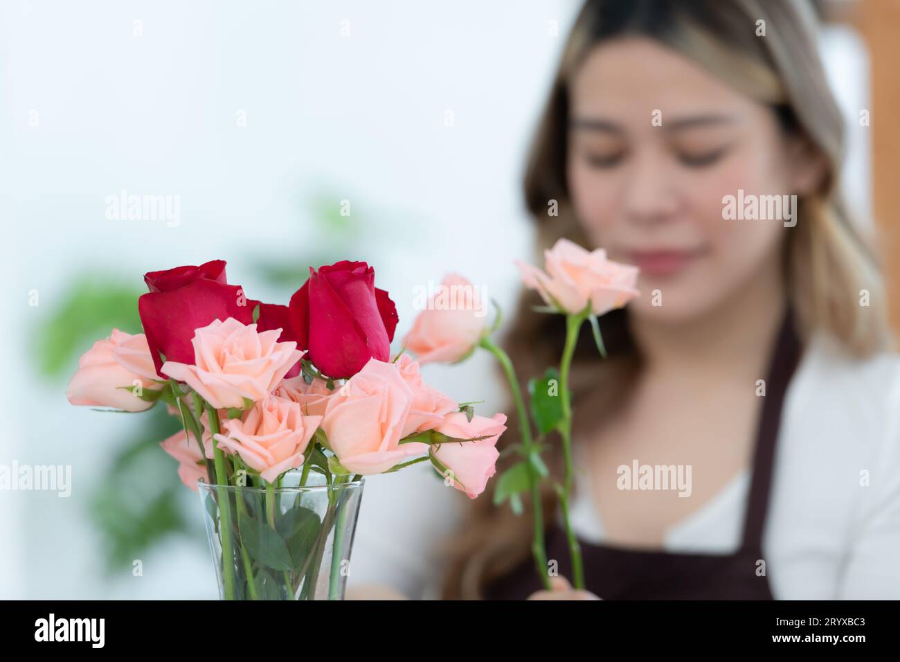Attractive asian girl bouquet roses hi-res stock photography and images ...