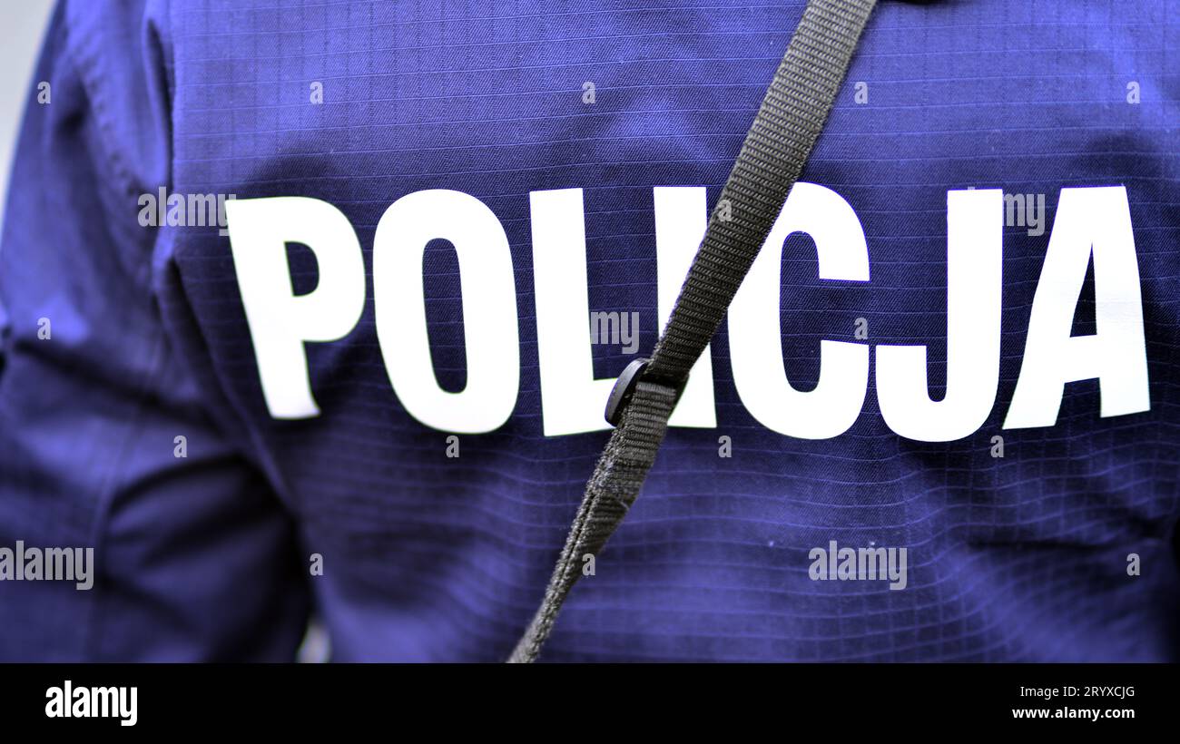 Police sign - logo on the back of the police uniform. Policja Stock ...