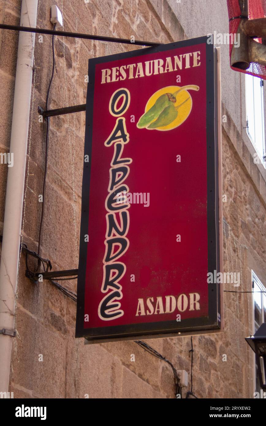 Under the sign of the green chilli. A restaurant sign in Northern Spain ...