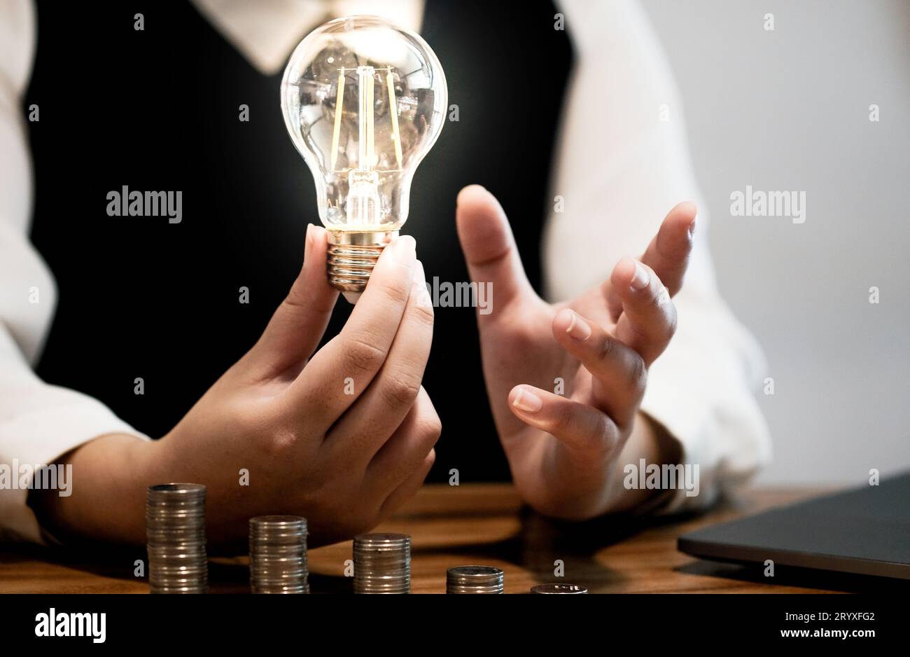 Saving coins idea with light bulb for investment Concept idea and ...