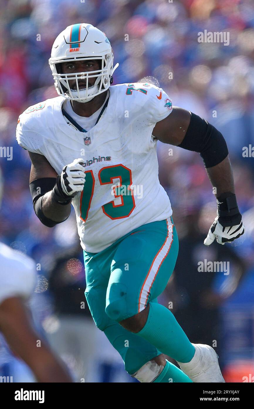 Miami Dolphins offensive lineman Austin Jackson (73) runs on the field ...