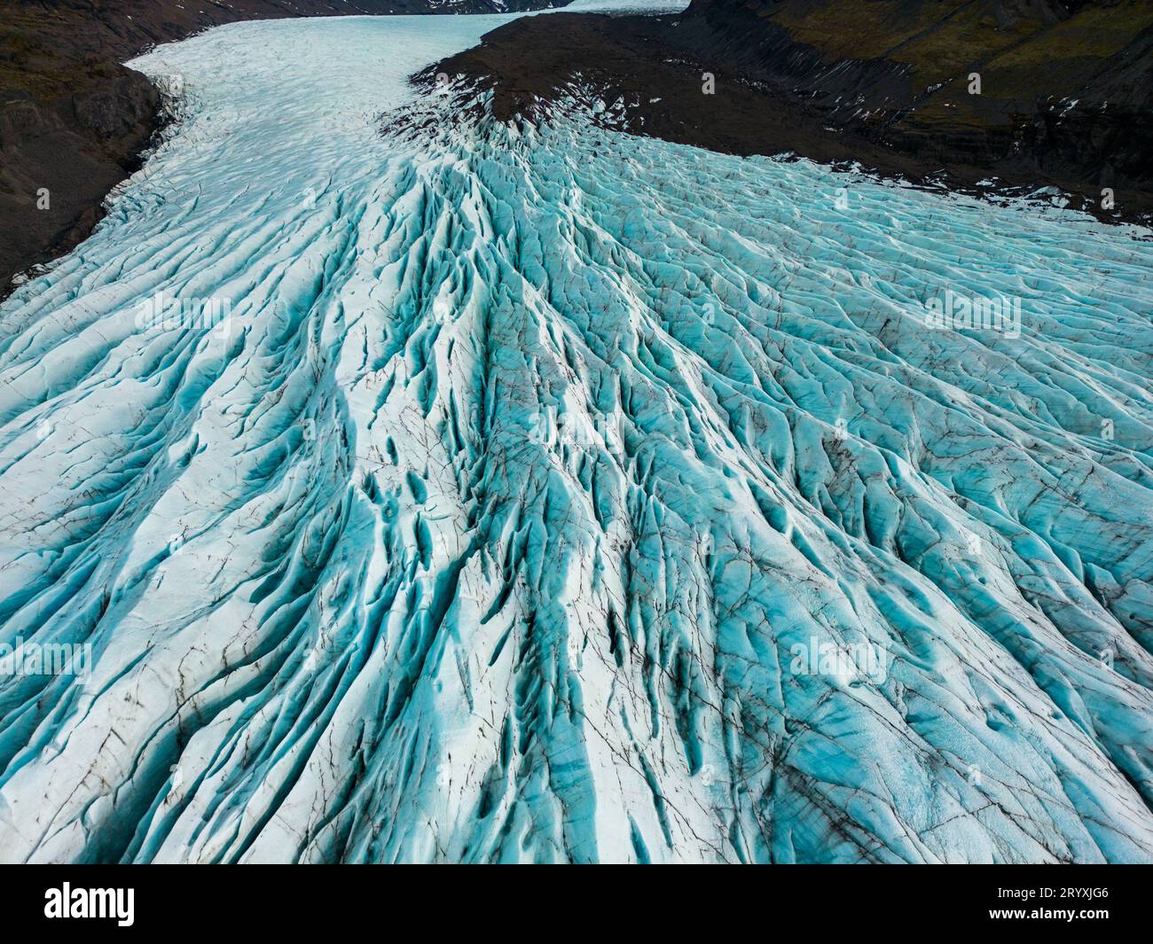 Drone shot of massive glacier in iceland, blue ice mass vatnajokull ...
