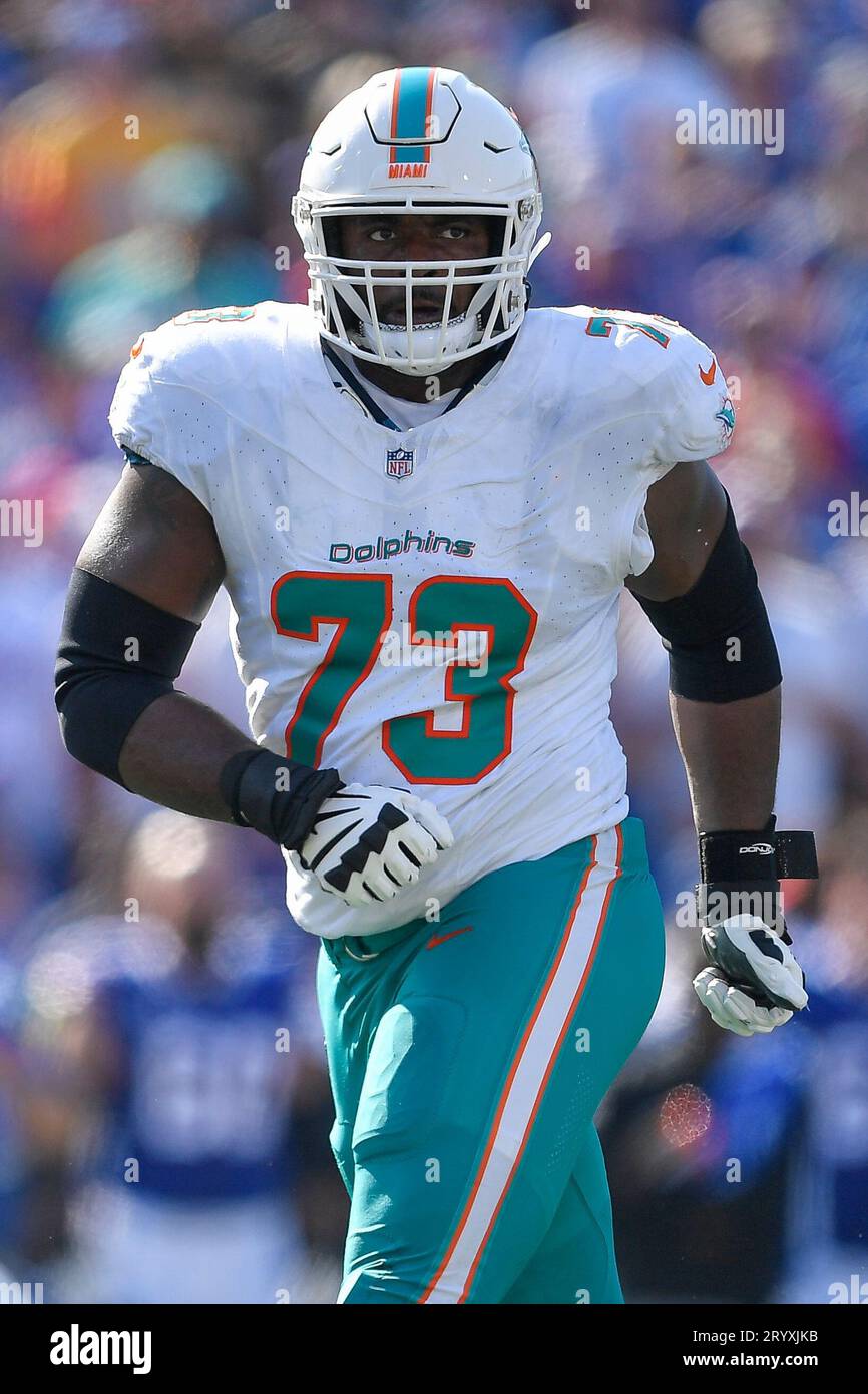 Miami Dolphins offensive lineman Austin Jackson (73) runs on the field ...
