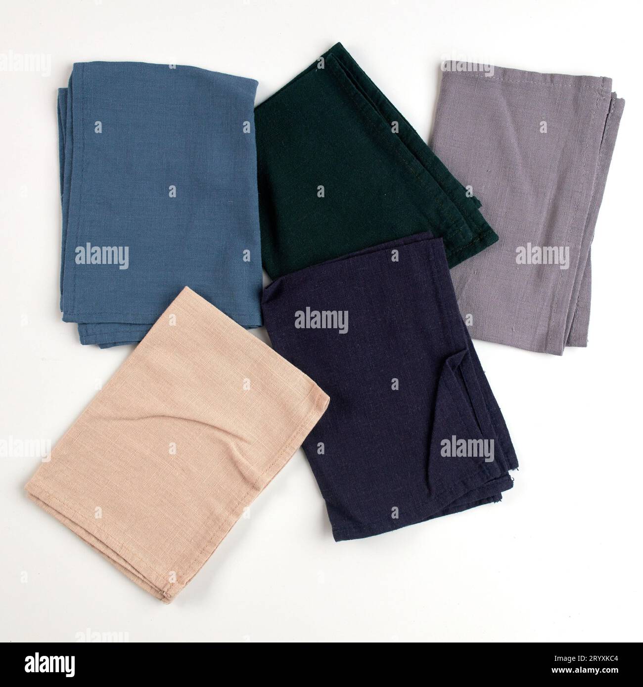 Napkins and towels on white background. Kitchen textiles, top view ...