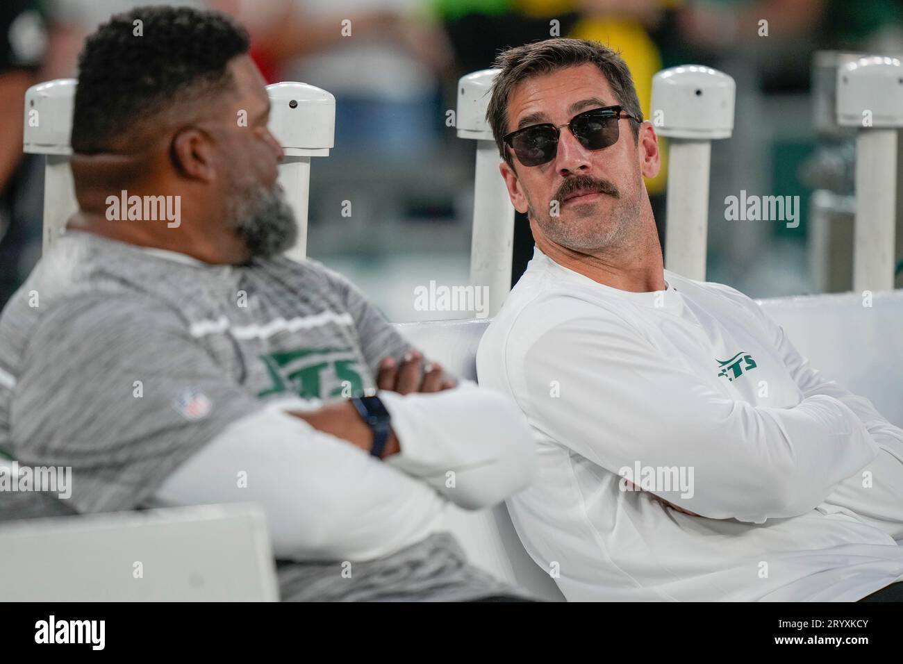New York Jets quarterback Aaron Roders sits on the sideline before an ...