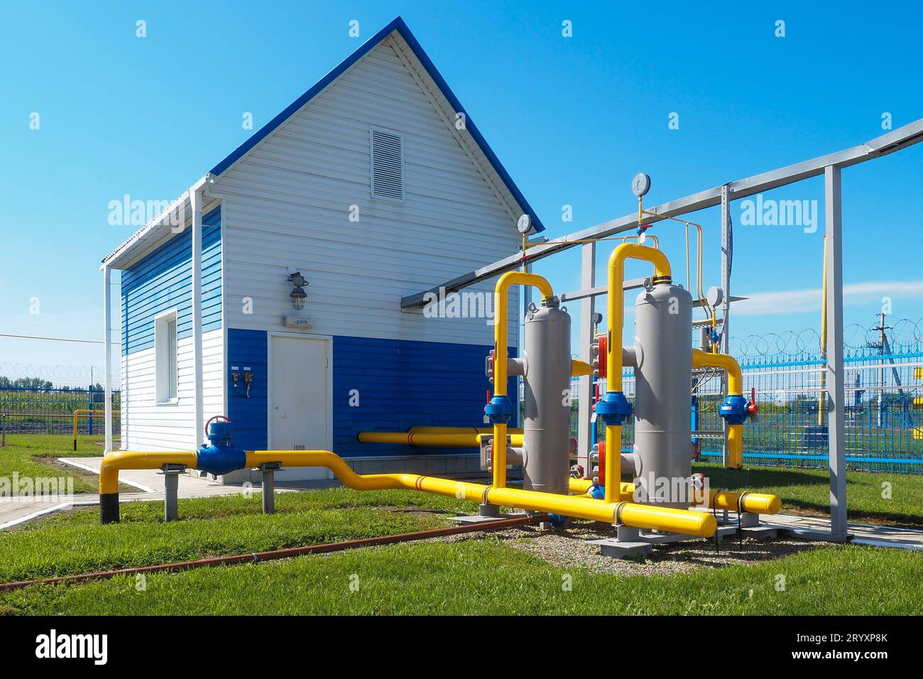 View of territory of gas distribution station from outside on sunny ...