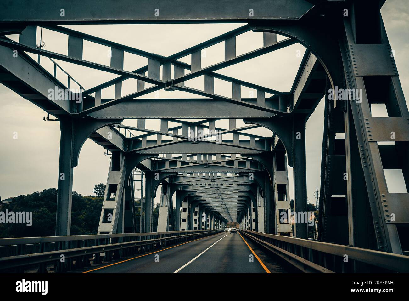 Road bridge over river with reinforced concrete floors. Tunnel long ...