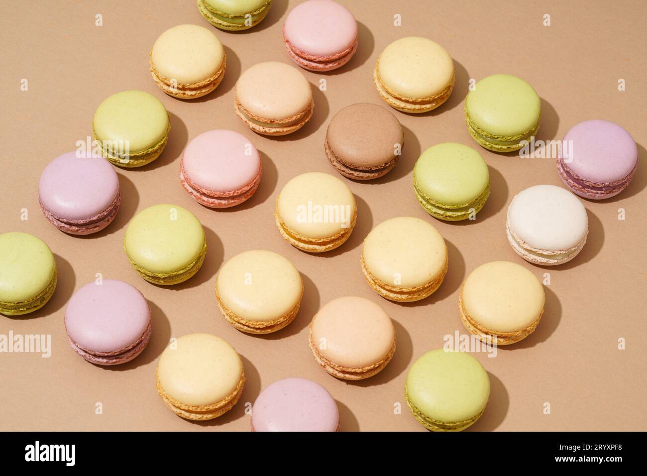 An overhead shot of a beige table surface featuring an array of ...