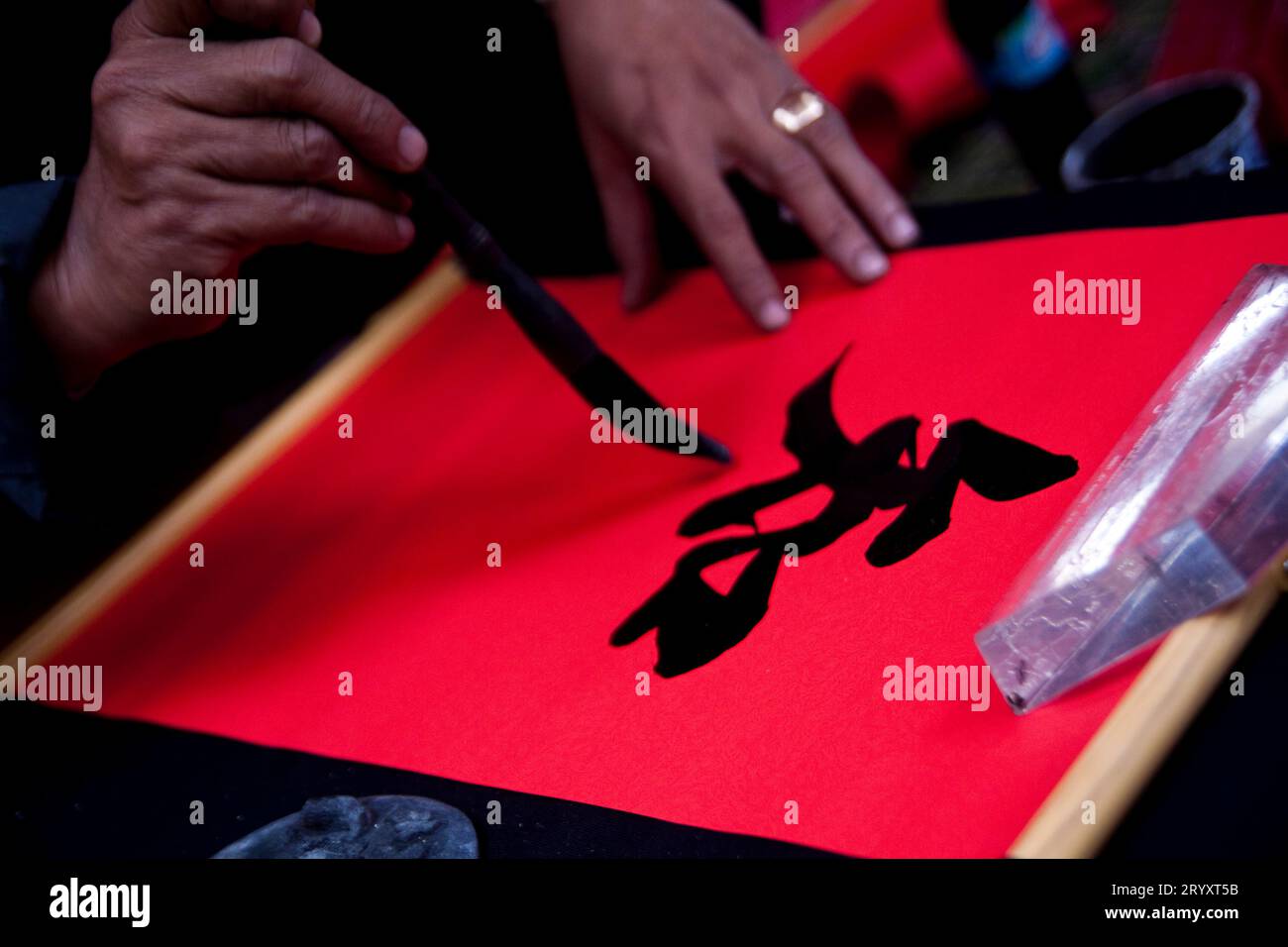 Close to the Temple of Literature, calligraphers show their skills ...